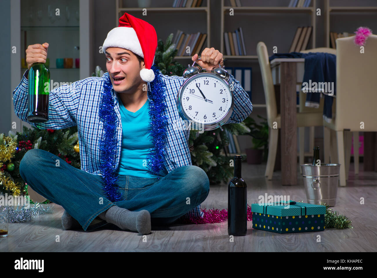 Man celebrating christmas at home alone Stock Photo - Alamy