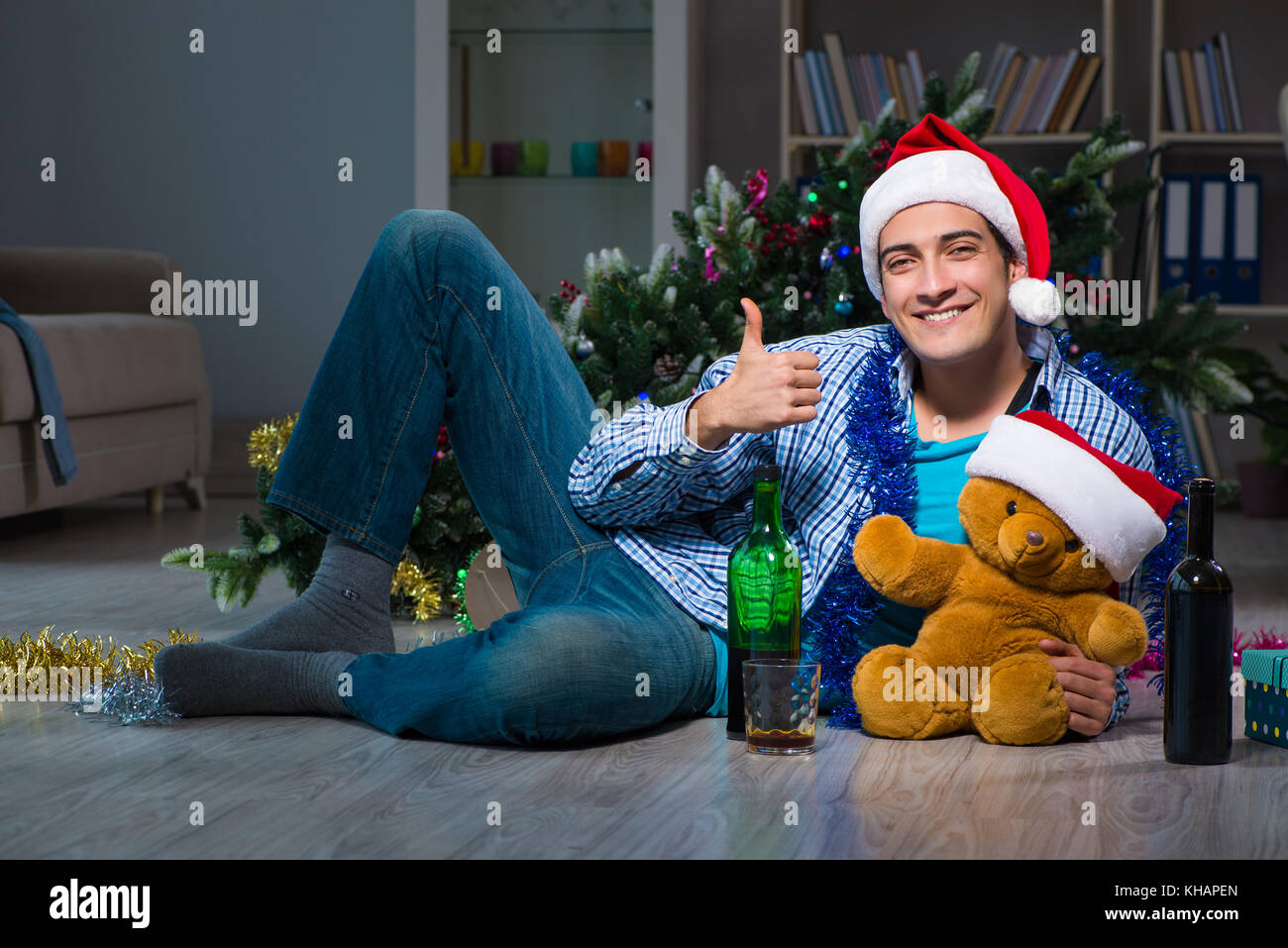 Man celebrating christmas at home alone Stock Photo - Alamy