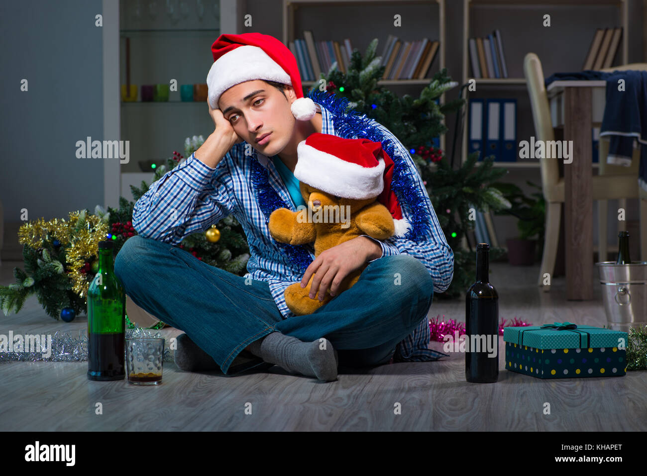 Man celebrating christmas at home alone Stock Photo - Alamy