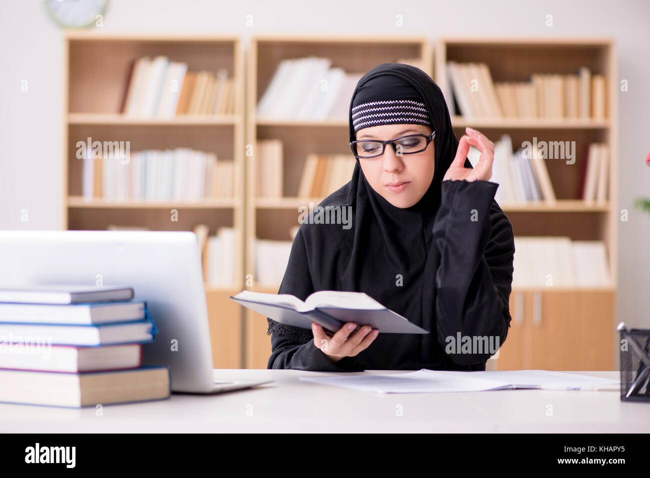 Muslim girl in hijab studying preparing for exams Stock Photo - Alamy