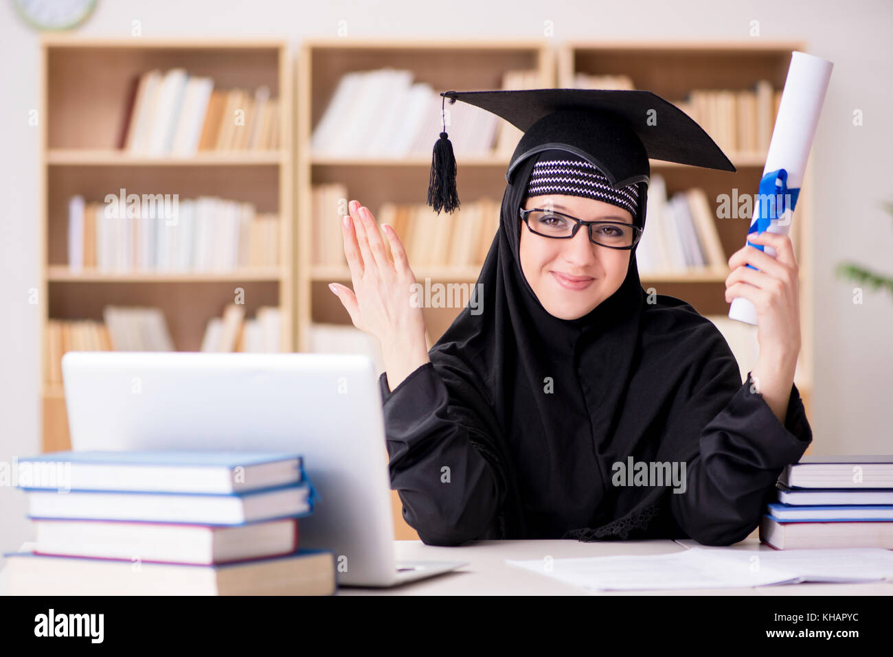 Muslim girl in hijab studying preparing for exams Stock Photo - Alamy
