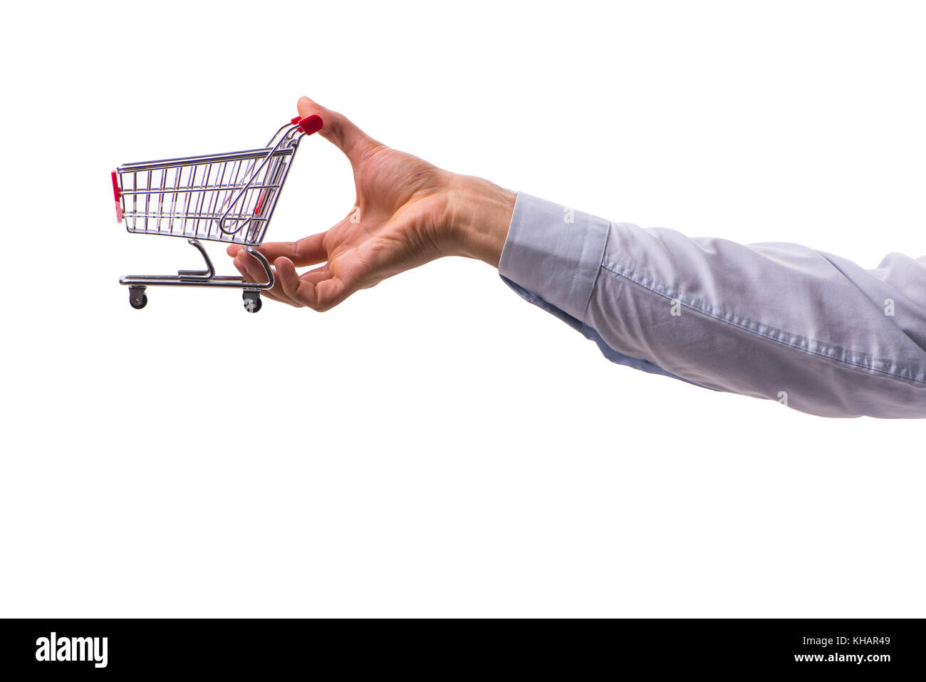 Hand holding shopping cart isolated on white Stock Photo - Alamy