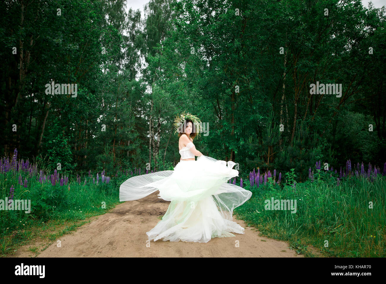 The bride is spinning in her wedding dress Stock Photo - Alamy