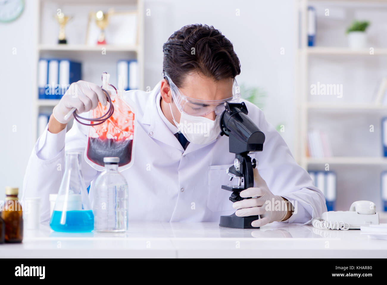 Doctor working with blood samples in hospital clinic lab Stock Photo ...