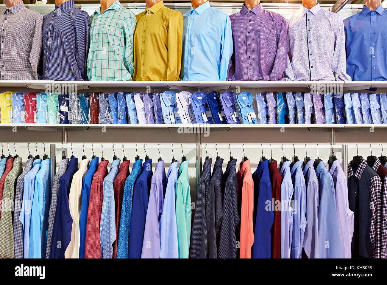 Men's shirts in the clothing store Stock Photo - Alamy