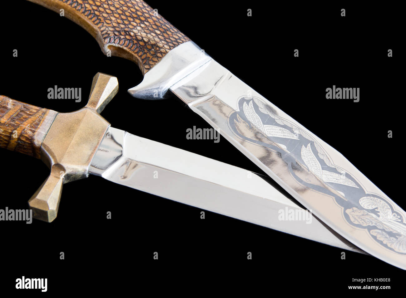 Photo of cold weapon on black background Stock Photo - Alamy