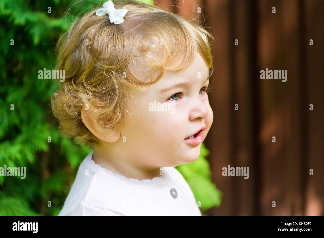 Photo of beautiful cute smiling infant girl Stock Photo - Alamy