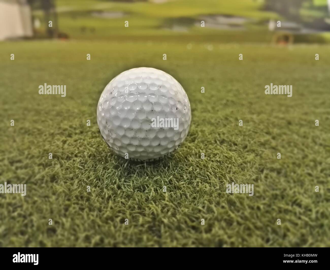 Golf ball on practice place green color and the ball in white Stock ...