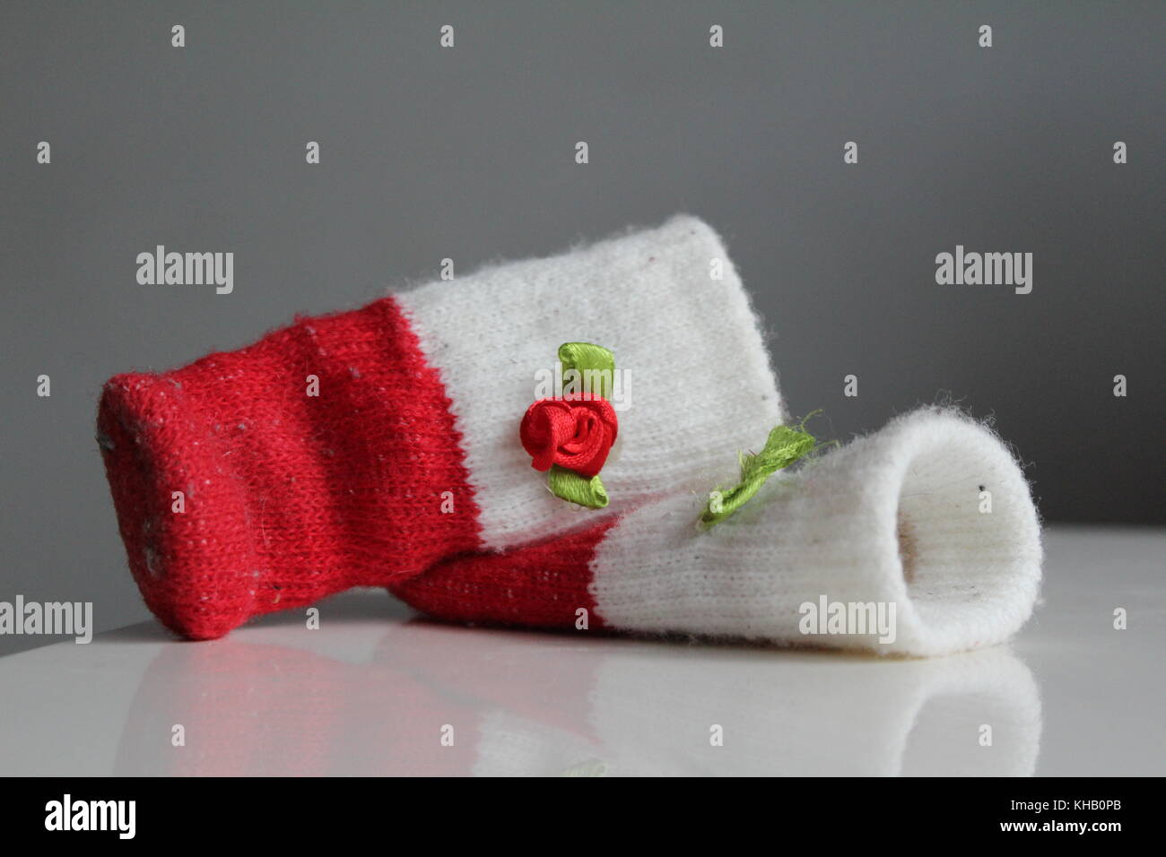 red sock on table Stock Photo - Alamy
