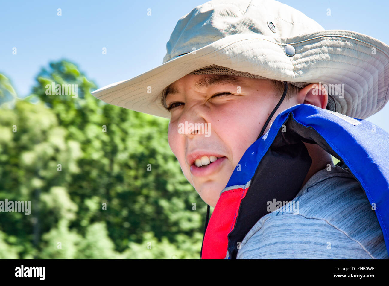 Boy in a hut and a life jacket, vacation, holidays happy kid portrait ...