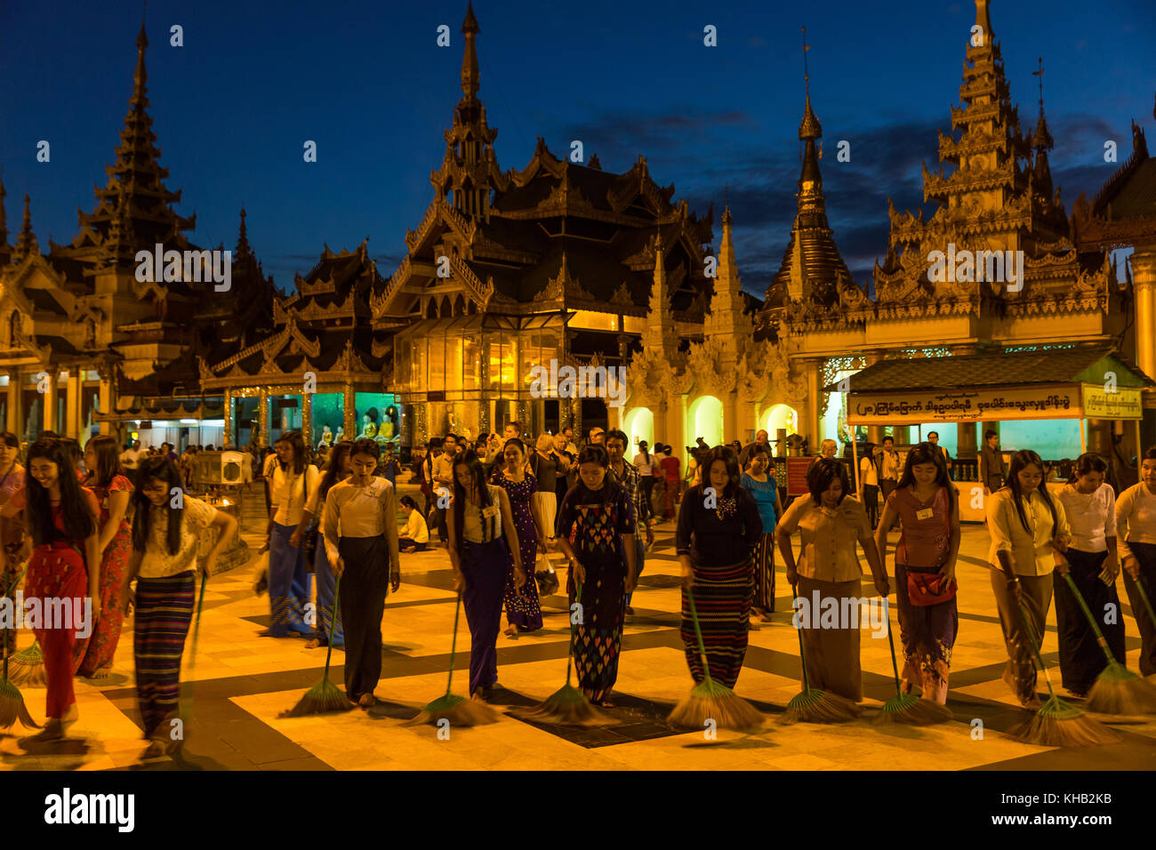 YANGON, MYANMAR - DECEMBER 16, 2016 : women cleaning the soil of the ...
