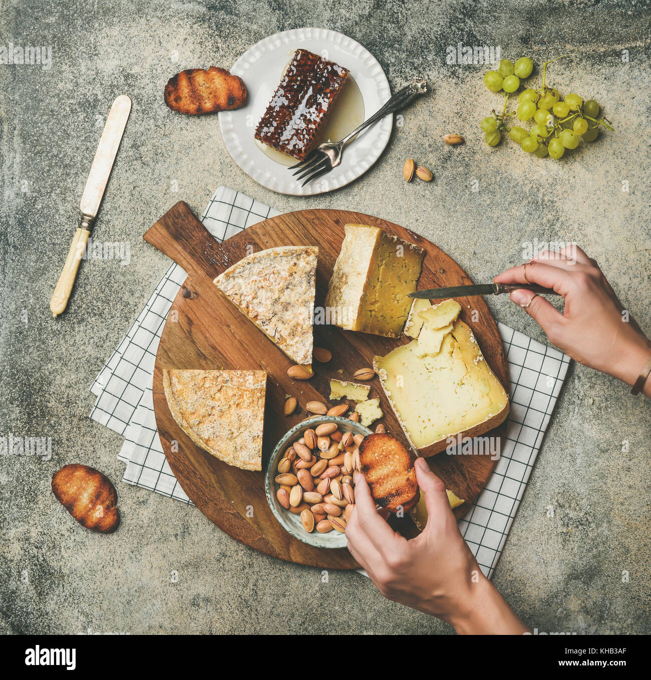 Food table overhead hands reaching hi-res stock photography and images ...