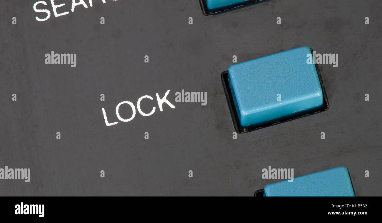 Button used to lock in a frequency on a scanning radio Stock Photo - Alamy