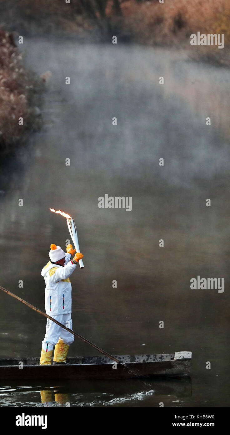 15th Nov, 2017. Torch relay for PyeongChang Olympics in wetland This ...