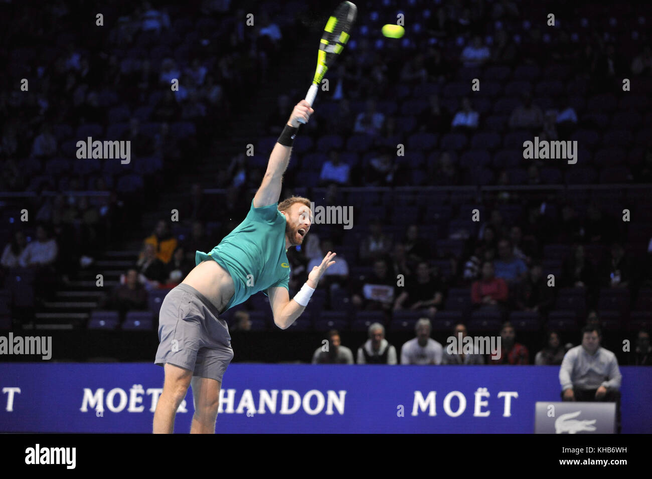 Ryan Harrison (USA) serving during the doubles competition in the Nitto ...