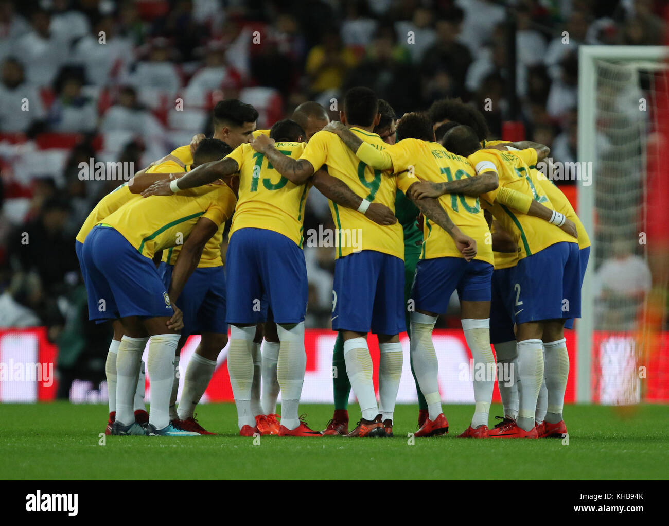 The Brazil team have a pre-match huddle at the England v Brazil ...