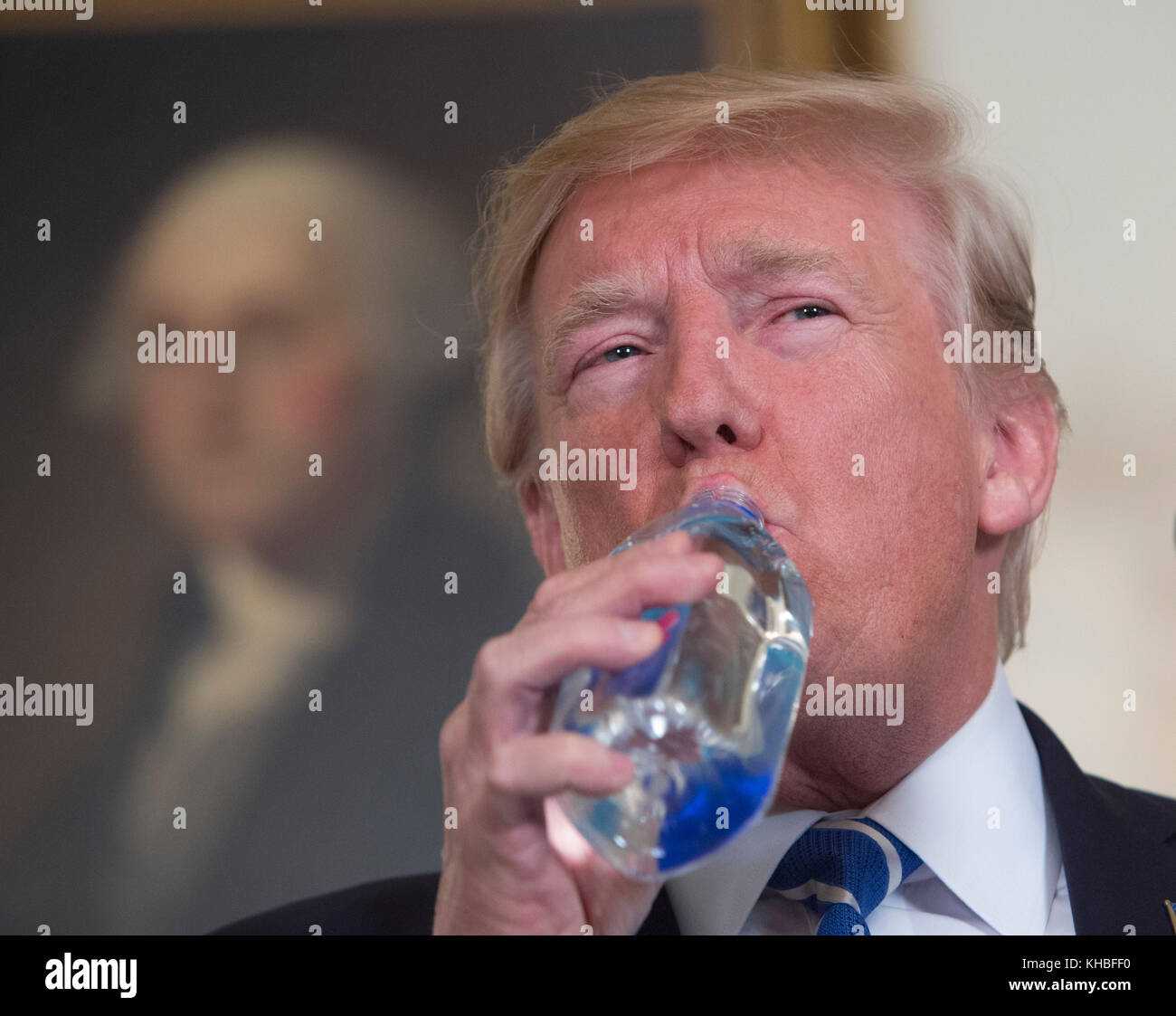 United States President Donald J. Trump takes a sip of water while ...