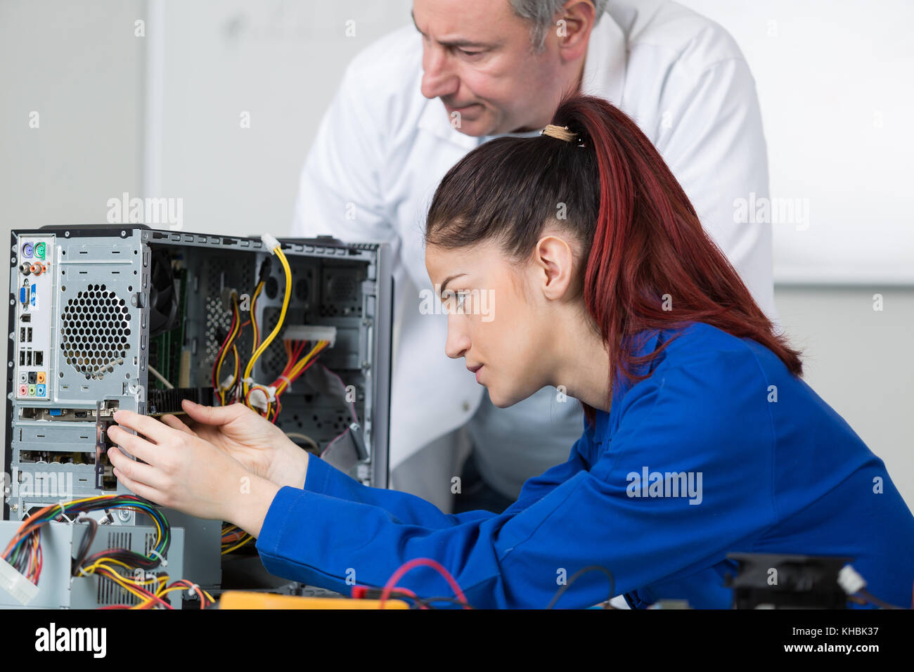 female technician working with transistor Stock Photo - Alamy