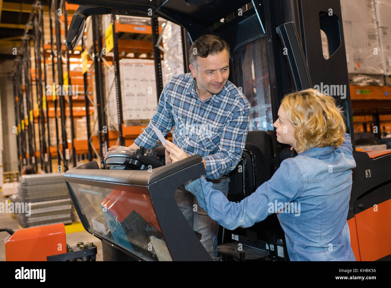 warehouse workers chatting in distribution warehouse Stock Photo - Alamy