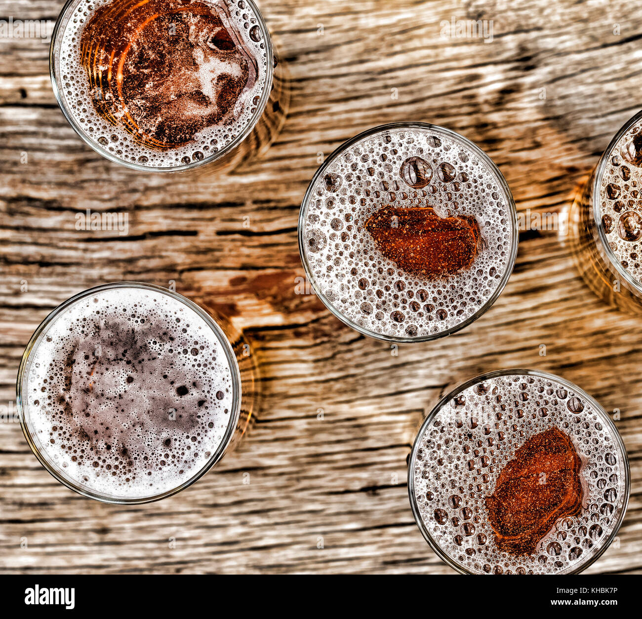 Pouring beer. View from above. Closeup wooden background Stock Photo ...