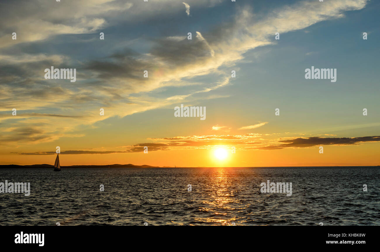 Sunset at the sea Stock Photo - Alamy