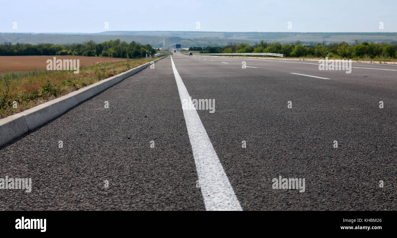 new asphalt road for fast driving at summer Stock Photo - Alamy