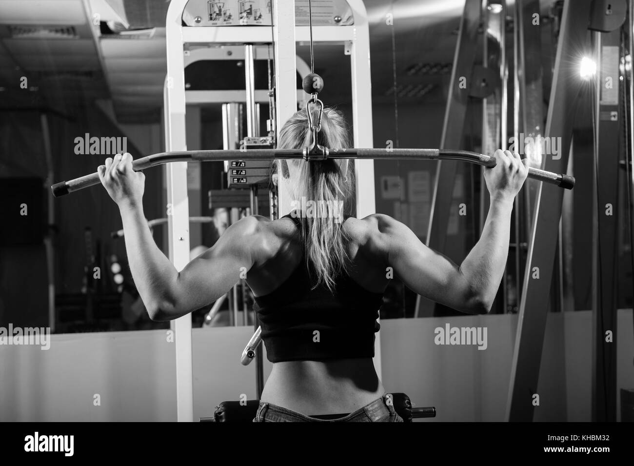 Young muscular woman doing workout Stock Photo - Alamy