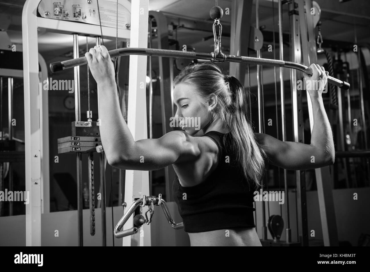 Young muscular woman doing workout Stock Photo - Alamy