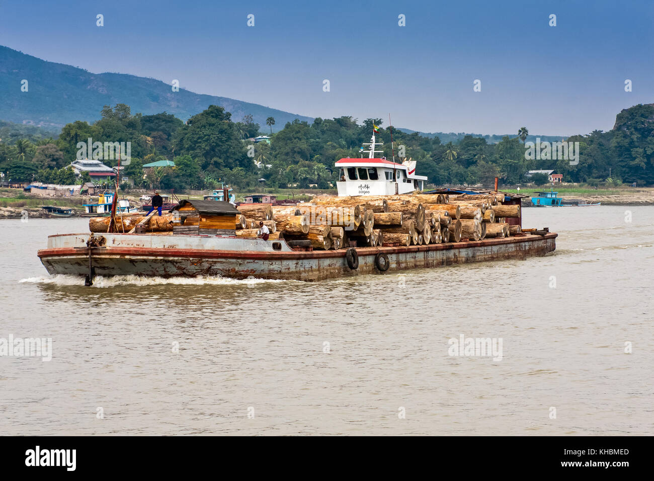 Barge with wood on the Irrawaddy River near Mandalay, Myanmar Stock ...