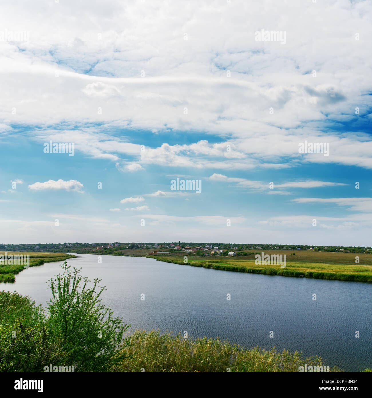 cloudy sky and river Stock Photo - Alamy