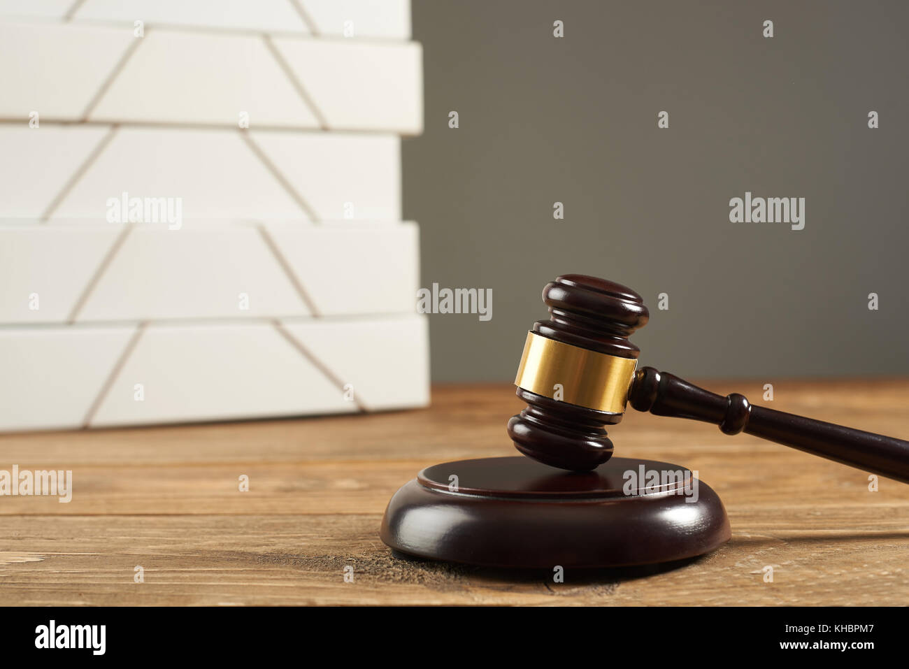 Judge gavel and file folders on wooden table Stock Photo - Alamy
