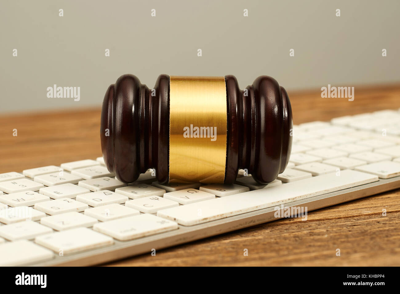 Judge gavel on computer keyboard Stock Photo - Alamy