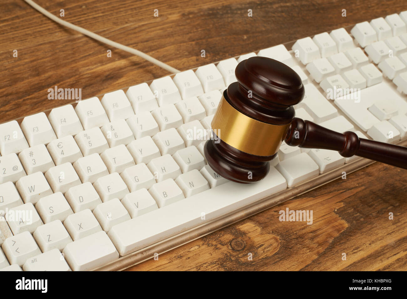 Judge gavel on computer keyboard Stock Photo - Alamy