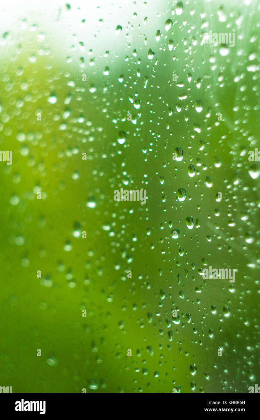 raindrops on the window glass, toned, close up Stock Photo - Alamy