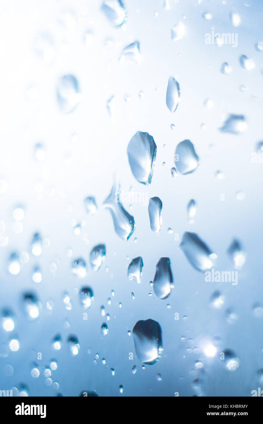 raindrops on the window glass, toned, close up Stock Photo - Alamy