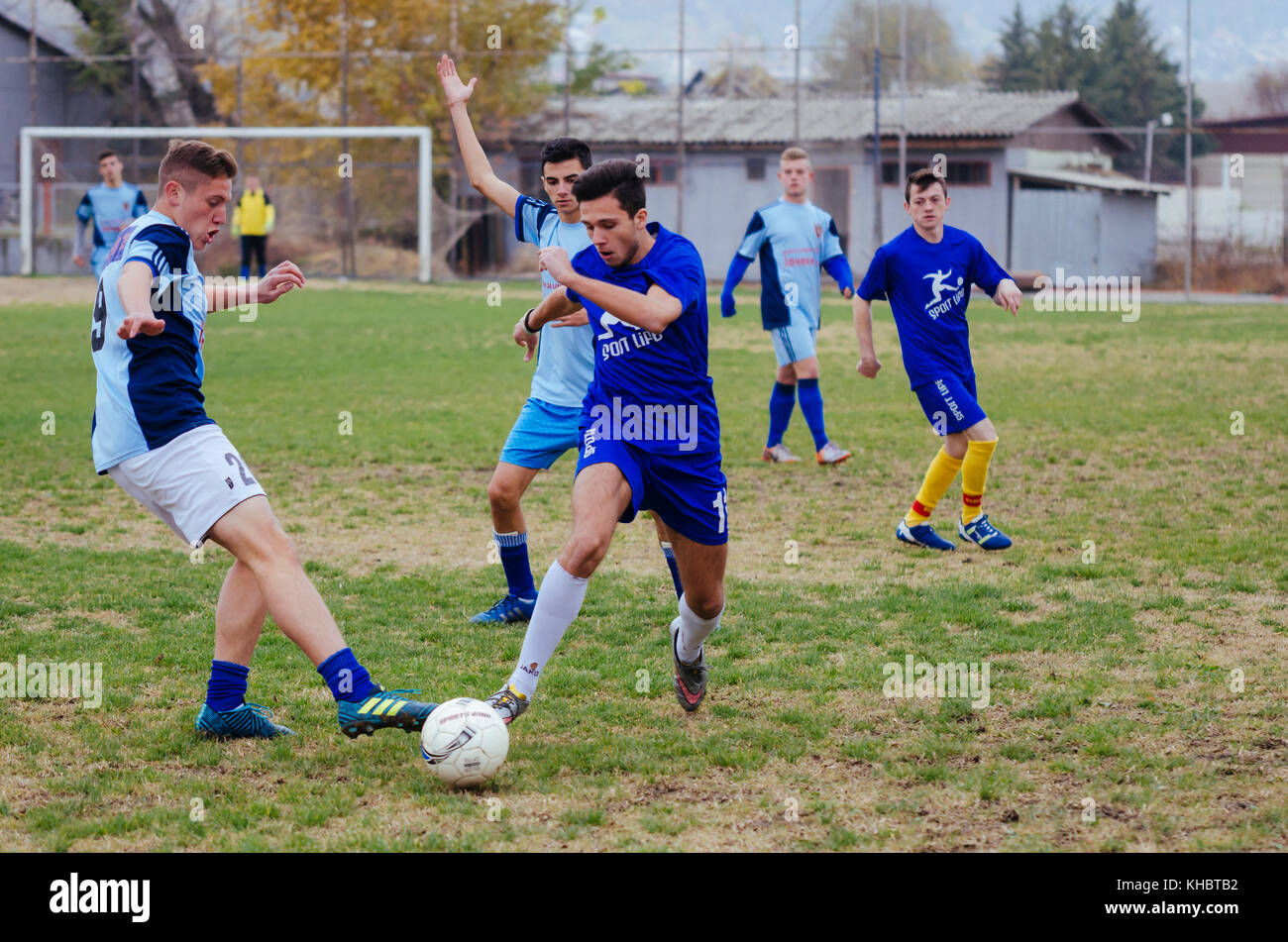 Men's are playing outdoor football match Stock Photo - Alamy