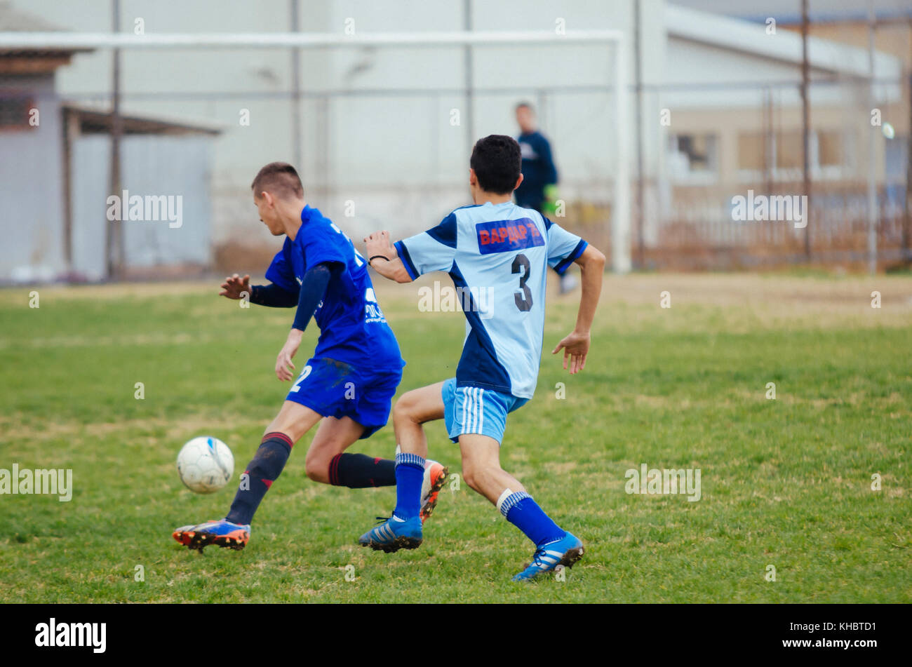 Men's are playing outdoor football match Stock Photo - Alamy