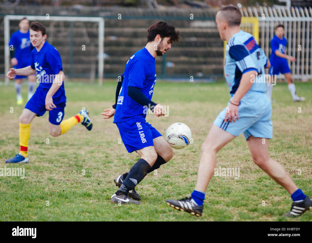 Men's are playing outdoor football match Stock Photo - Alamy