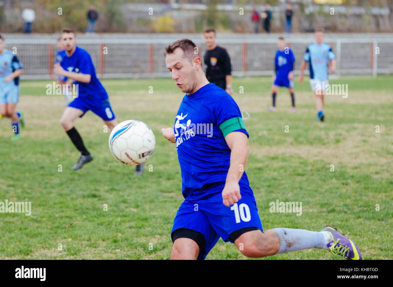 Men's are playing outdoor football match Stock Photo - Alamy