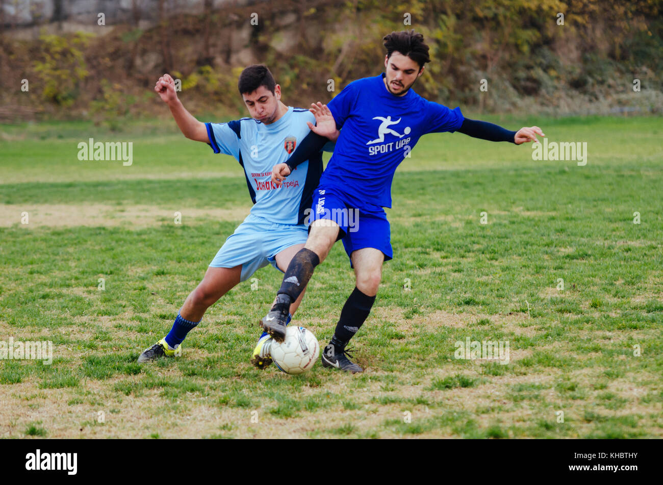Men's are playing outdoor football match Stock Photo - Alamy