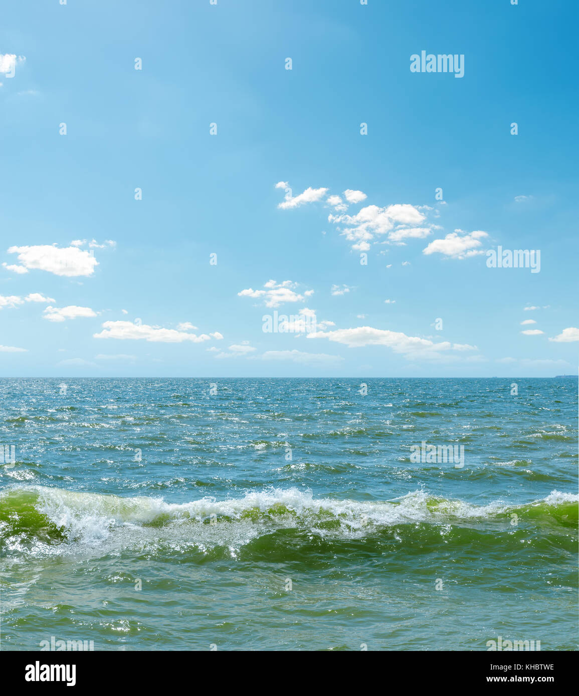splash on water and blue sky Stock Photo - Alamy