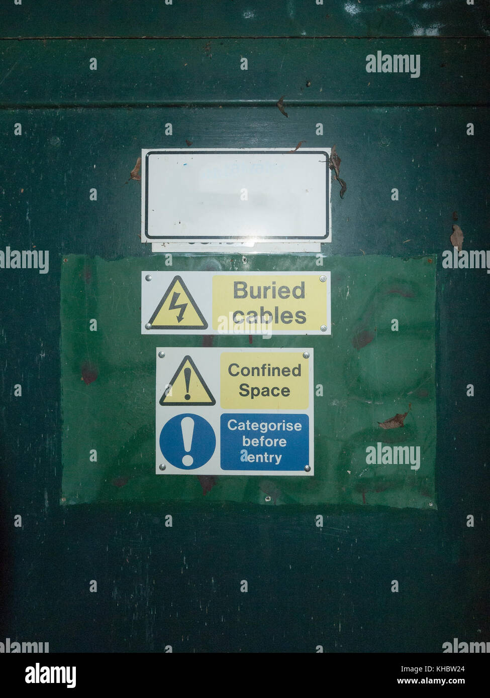 bunch of safety signs water green box yellow triangle; essex; england ...