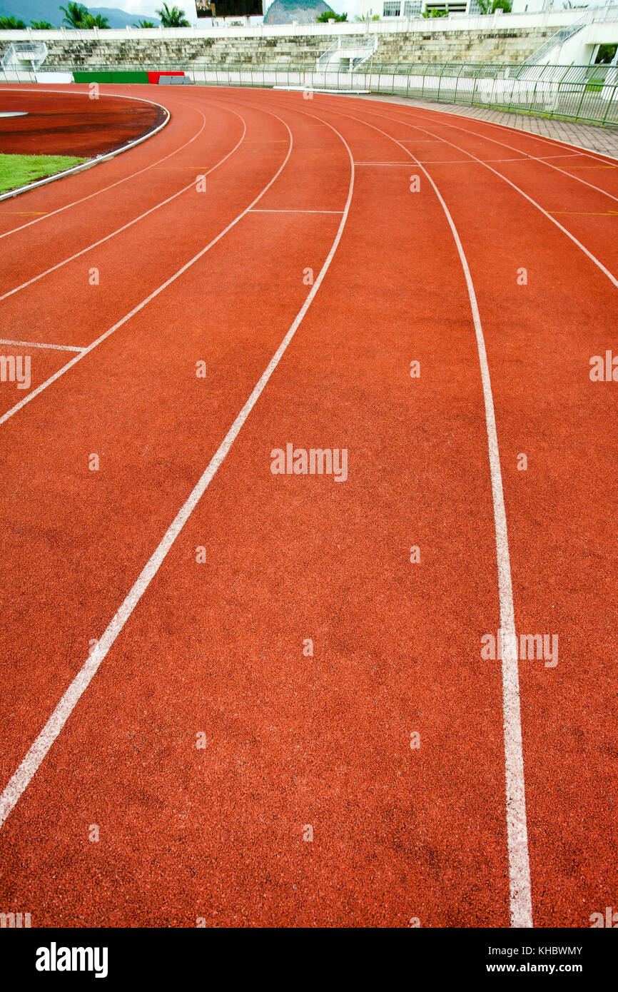 Red running Track in the stadium in Thailand Stock Photo - Alamy