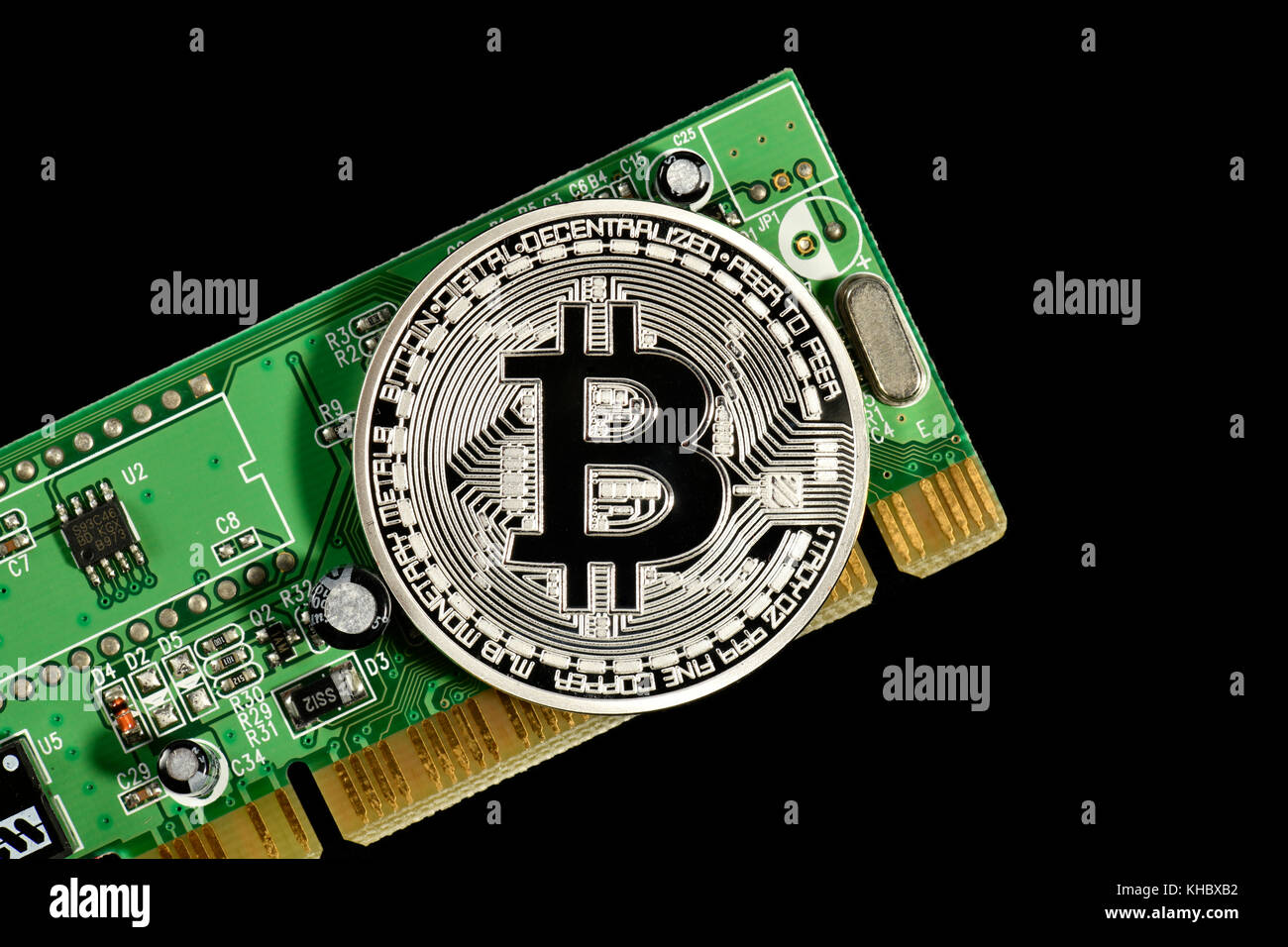 Symbol image digital currency, silver physical coin Bitcoin on printed ...