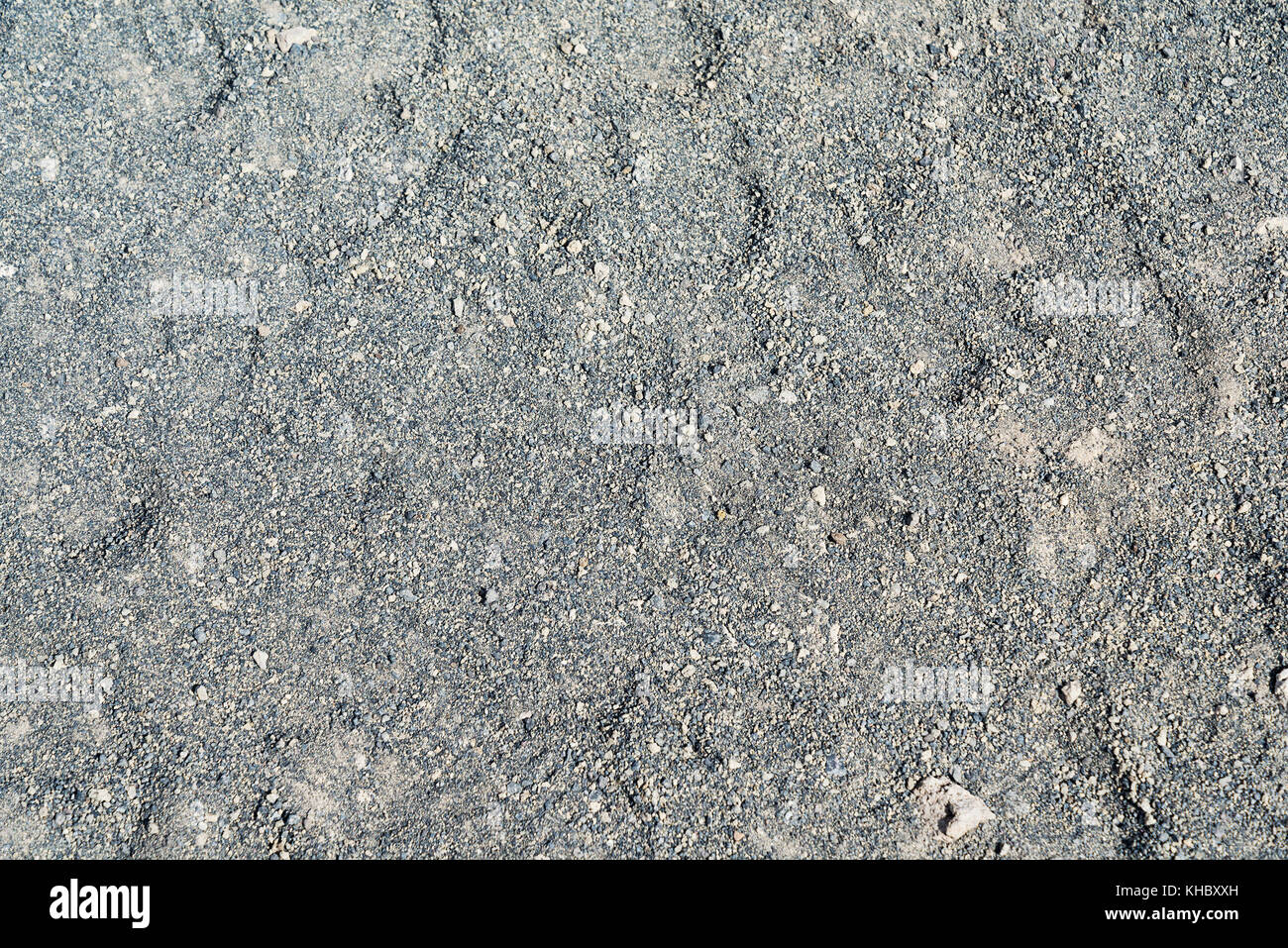 Volcanic slag scattered at the foot of the volcano, the background of ...