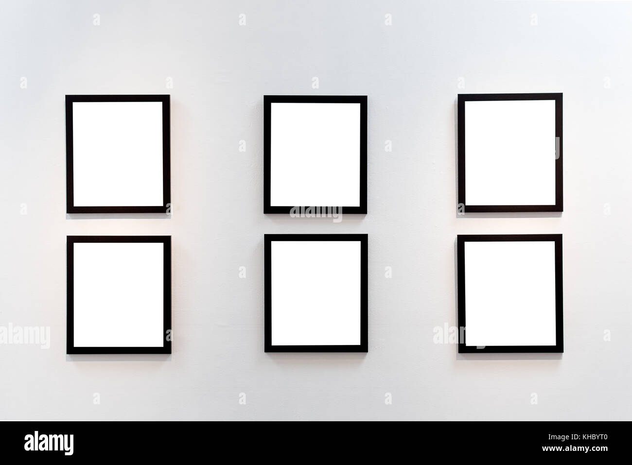 Empty frames on a wall Stock Photo - Alamy