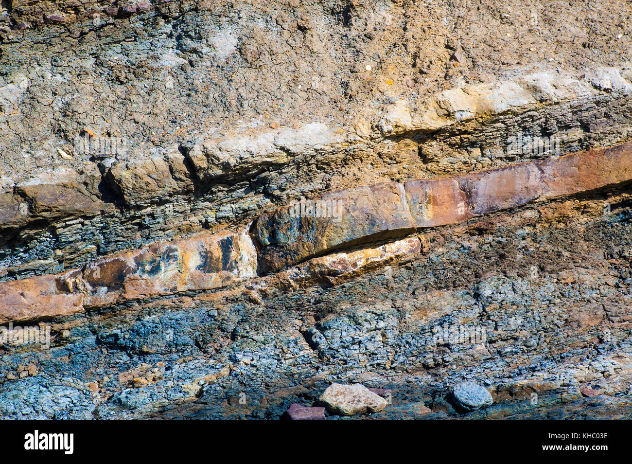 Strata, layered clay cliffs slowly eroding at Hanover Point, Compton ...