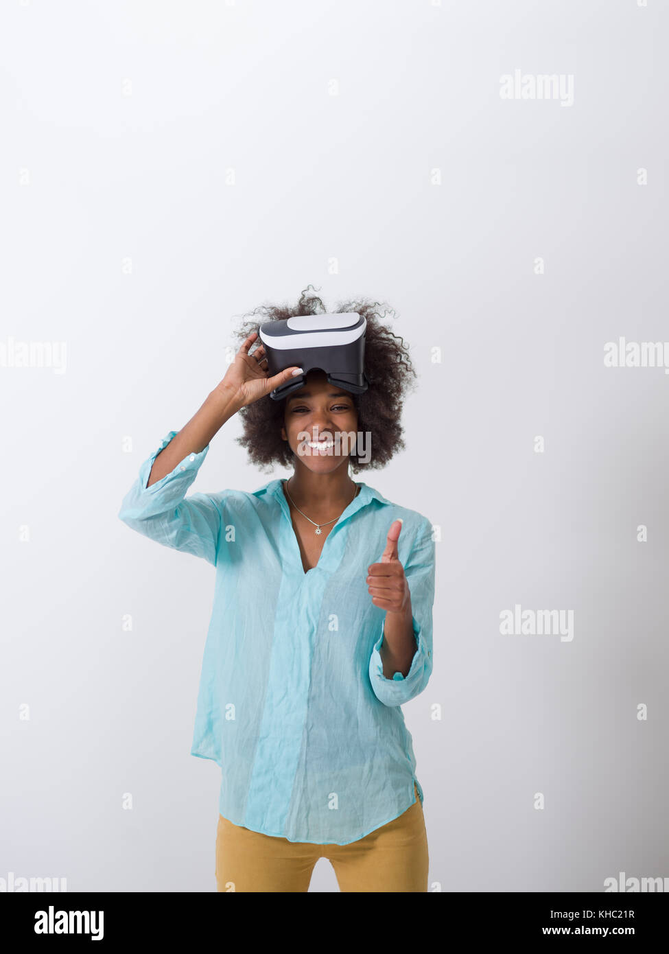 Happy african american girl getting experience using VR headset glasses ...