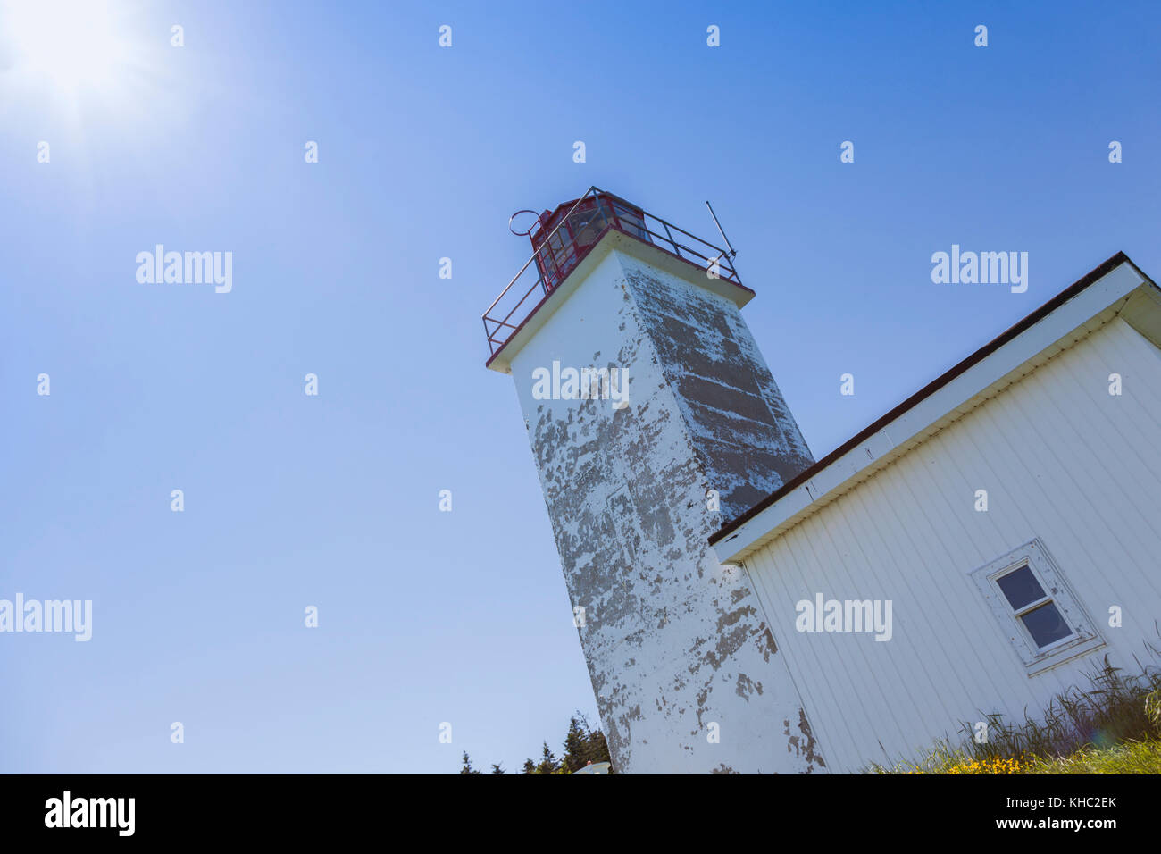 Quaco Head Lighthouse and blue sky. New Brunswick, Canada Stock Photo ...