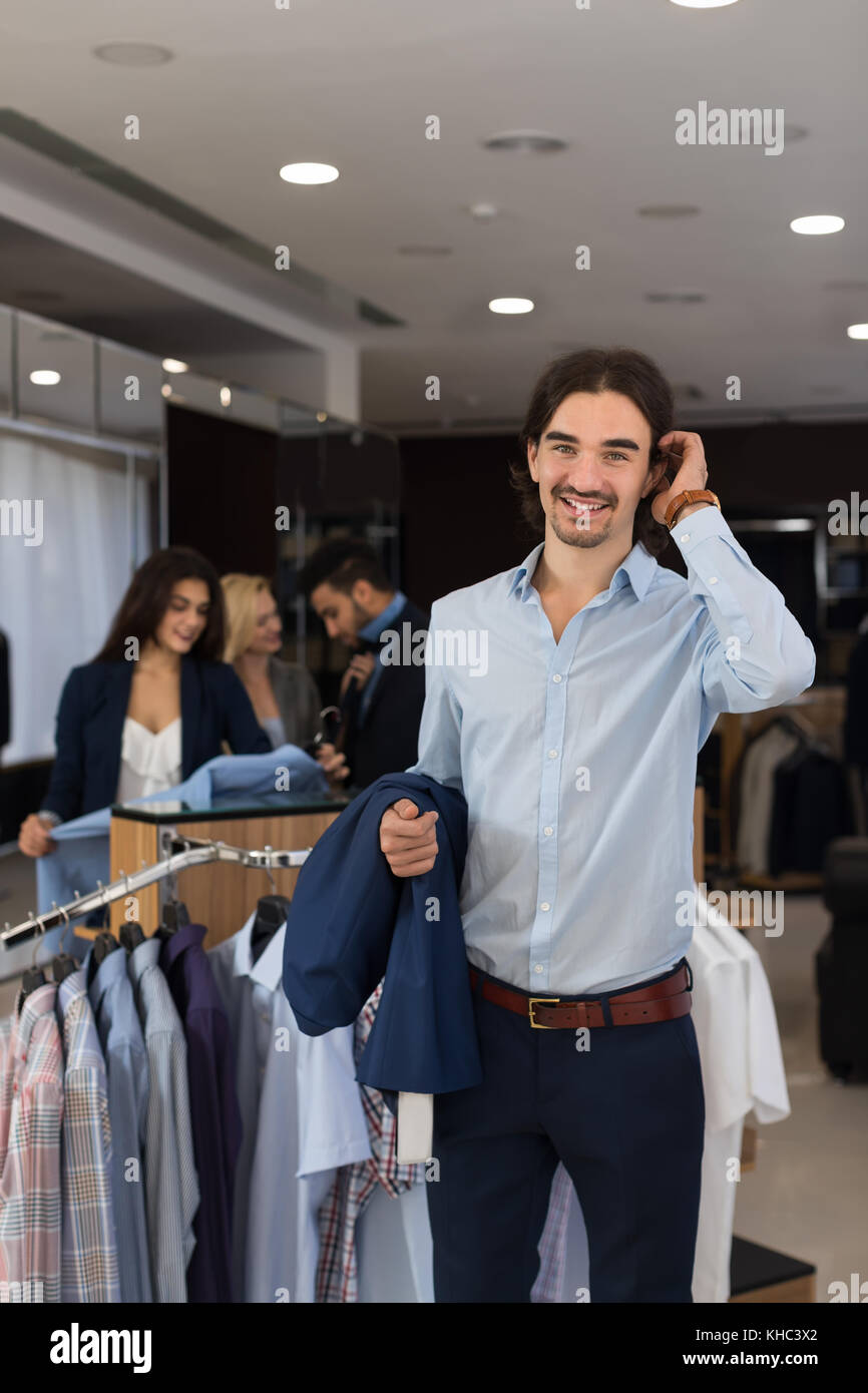 Handsome Business Man Wear Formal Suit Holding Jacket In Hands In ...